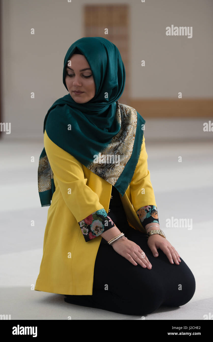 Muslim Woman Making Traditional Prayer To God In Mosque Stock Photo - Alamy