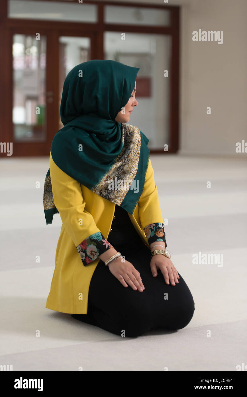 Muslim Woman Making Traditional Prayer To God In Mosque Stock Photo - Alamy
