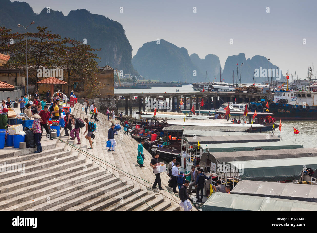 Vietnam, Halong City, Halong Bay tour boats, cruise pier Stock Photo ...