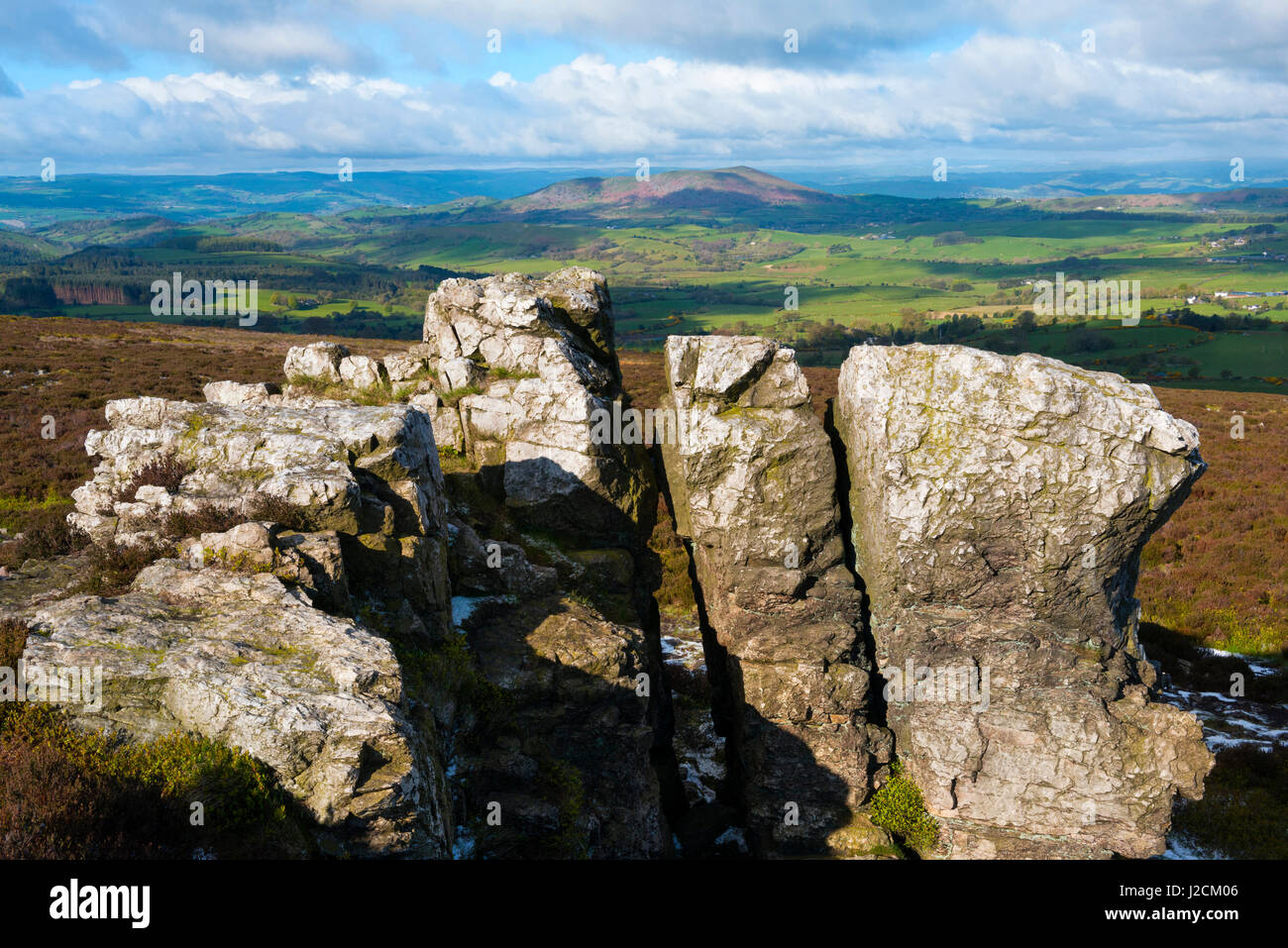 Quartzite rocks on the Stiperstones, Shropshire, with Corndon Hill ...