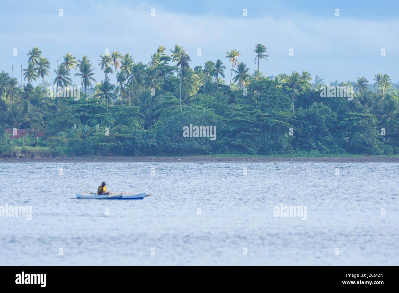Indonesia, Maluku Utara, Kabupaten Halmahera Utara, boat on the sea in ...
