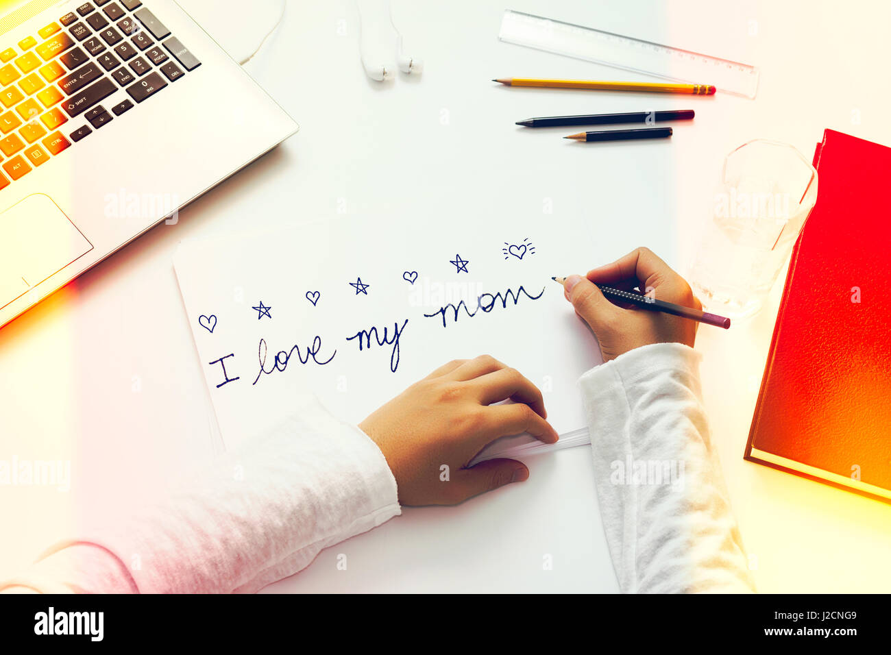 I love my mom, written in beautiful calligraphy by a child Stock Photo ...