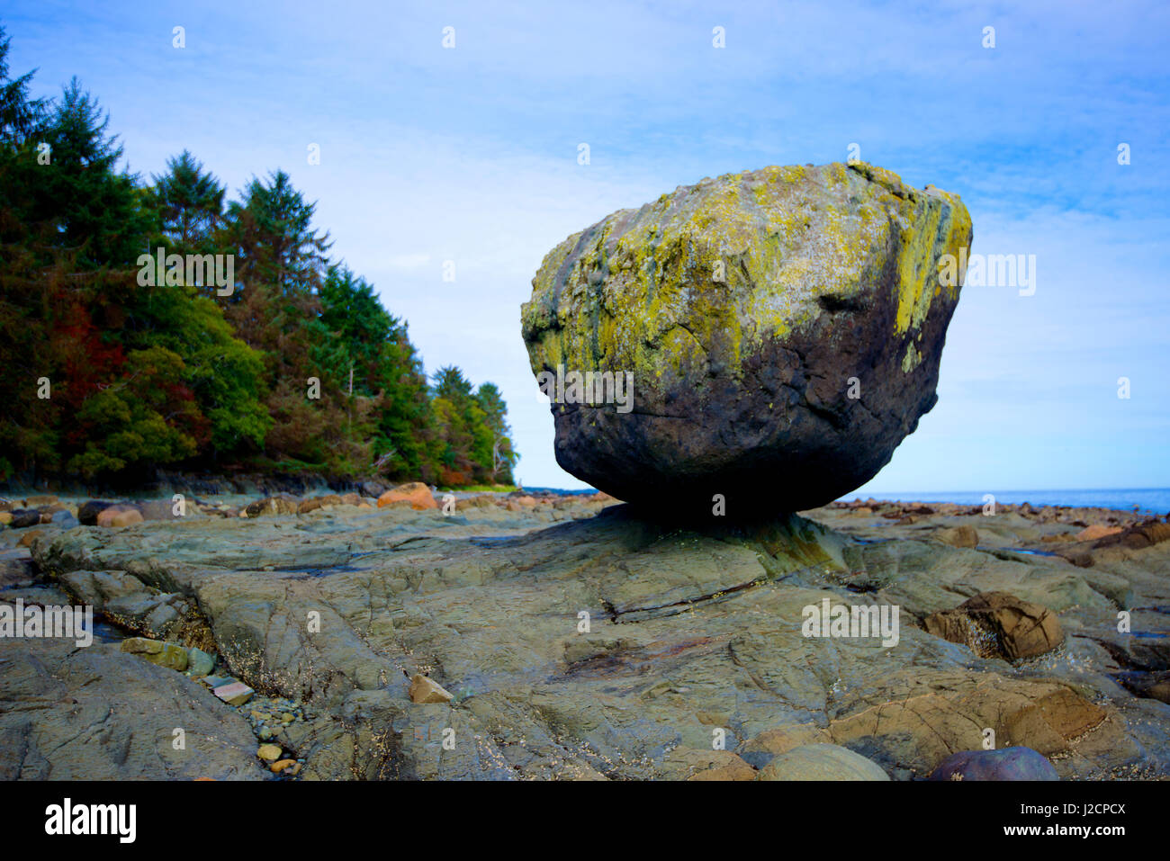 Balance Rock on the east coast of Graham Island. It is a glacial ...