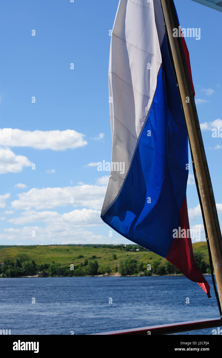 Russia flag close up with beautiful scenic background Stock Photo - Alamy