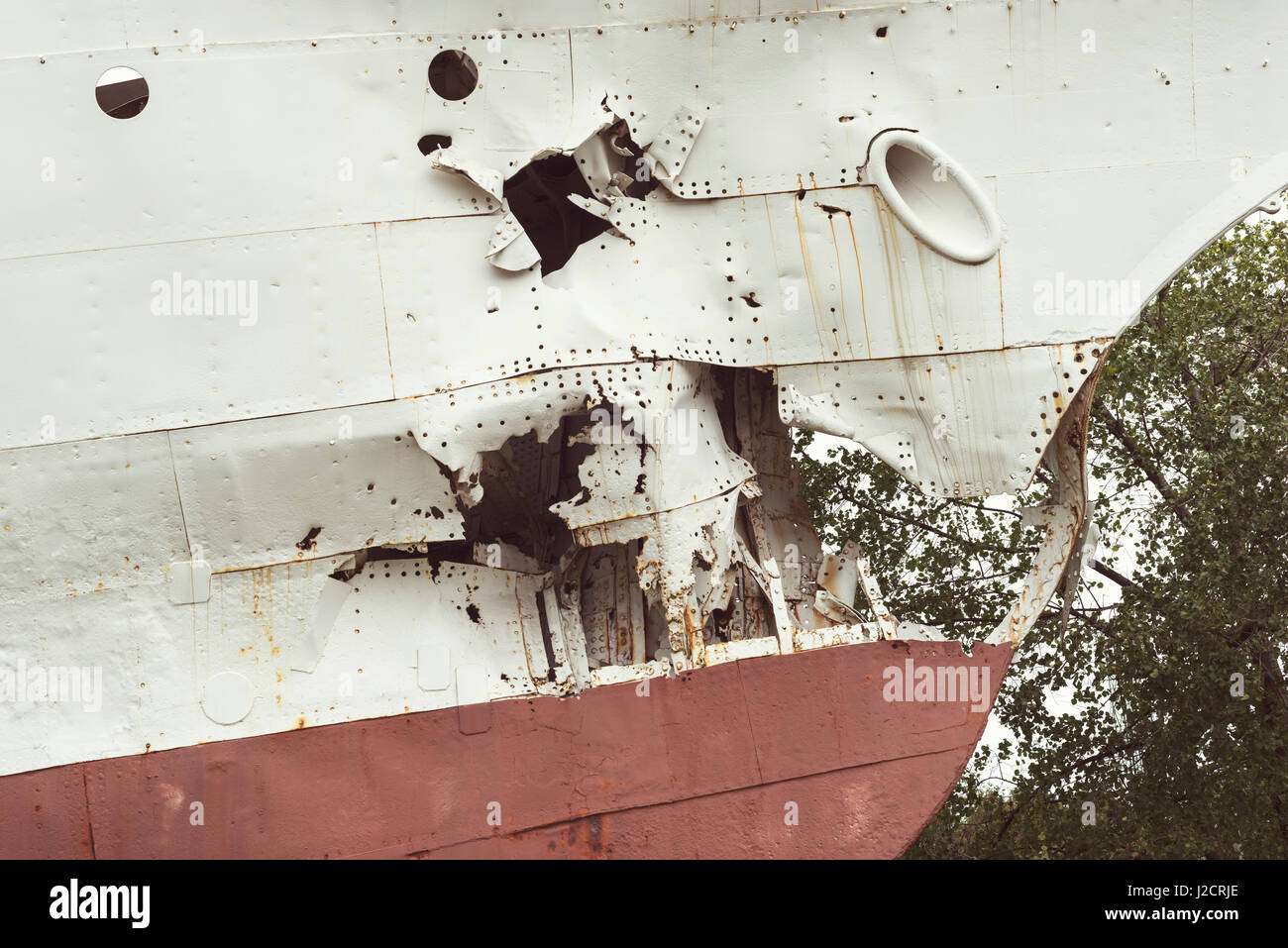 broken modern ship front fragment with huge hole Stock Photo - Alamy