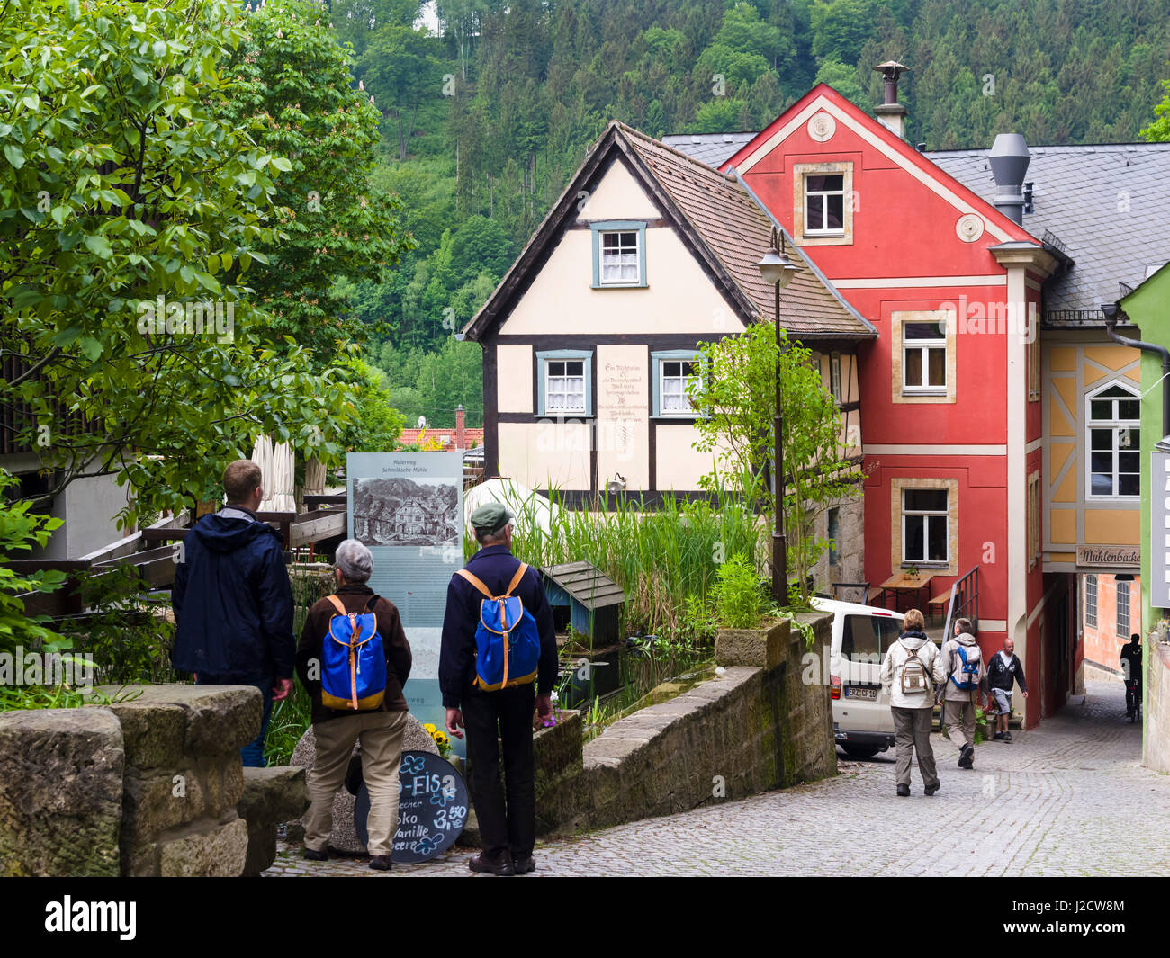 Traditional half-timbered buildings in the village of Schmilka in ...