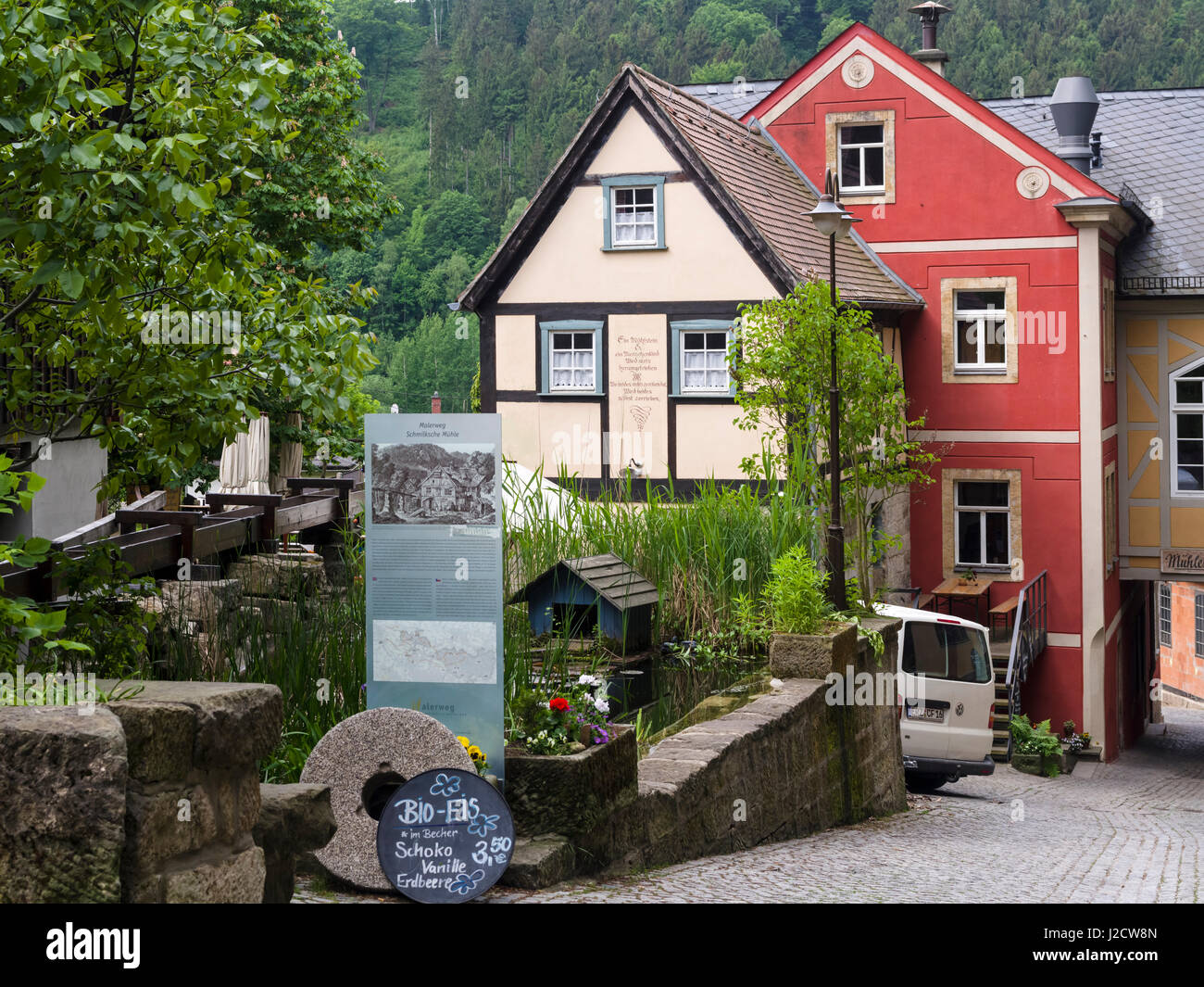 Traditional half-timbered buildings in the village of Schmilka in ...