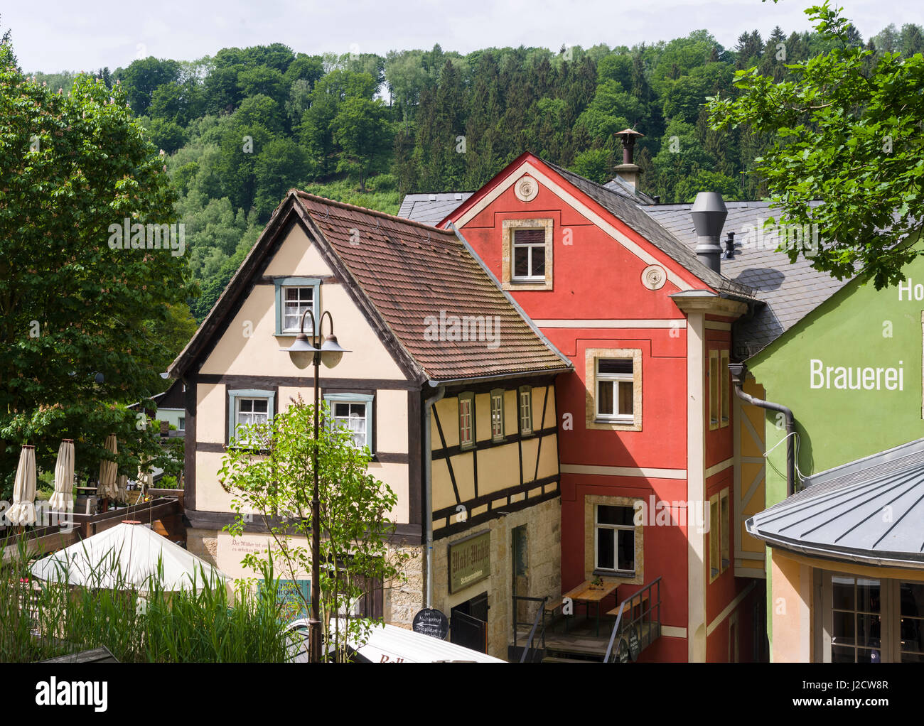 Traditional half-timbered buildings in the village of Schmilka in ...