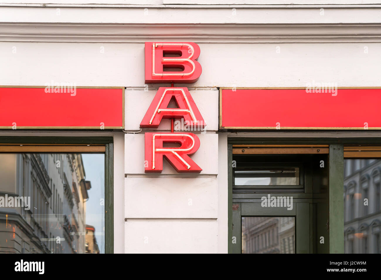 red neon bar sign at a pub Stock Photo - Alamy