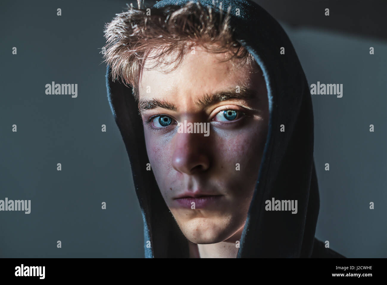 wide angle portrait of a young man Stock Photo - Alamy