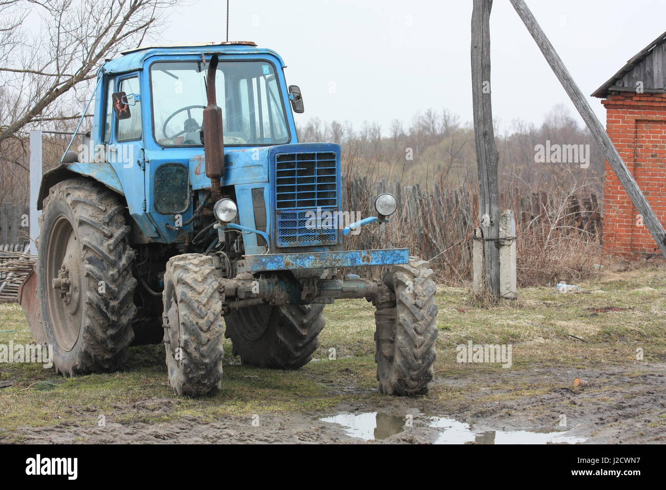 Old tractor. Russia, the Ryazan Region. April 7, 2017 Stock Photo - Alamy