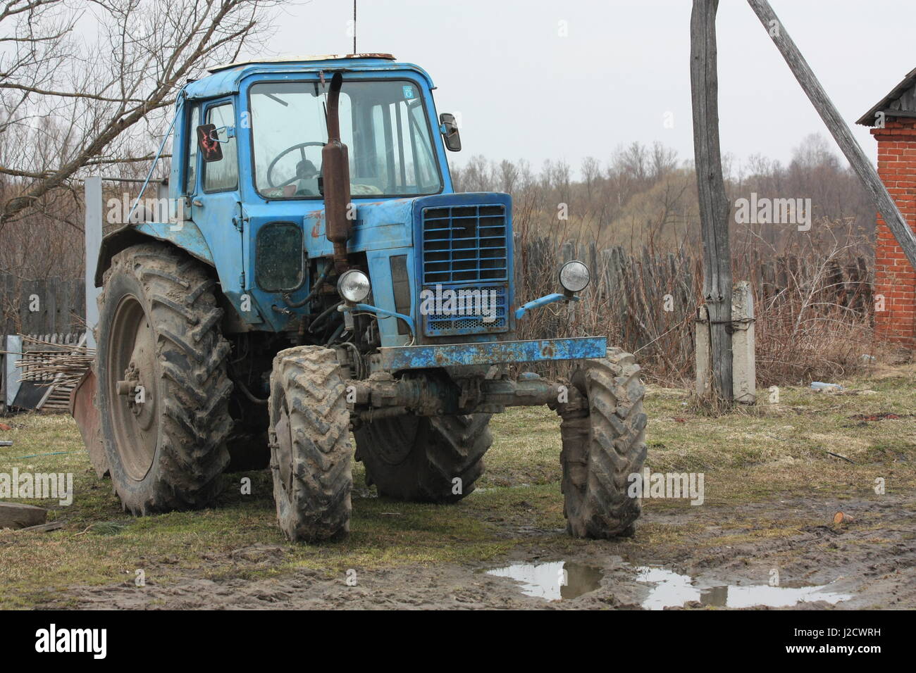 Old tractor. Russia, the Ryazan Region. April 7, 2017 Stock Photo - Alamy