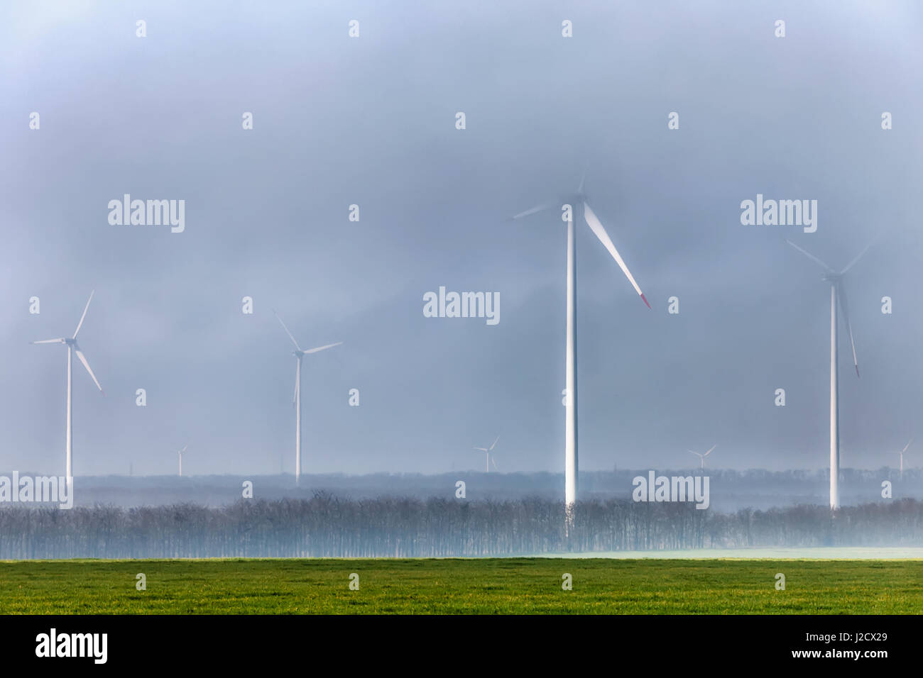 Wind turbines at stormy weather Stock Photo - Alamy