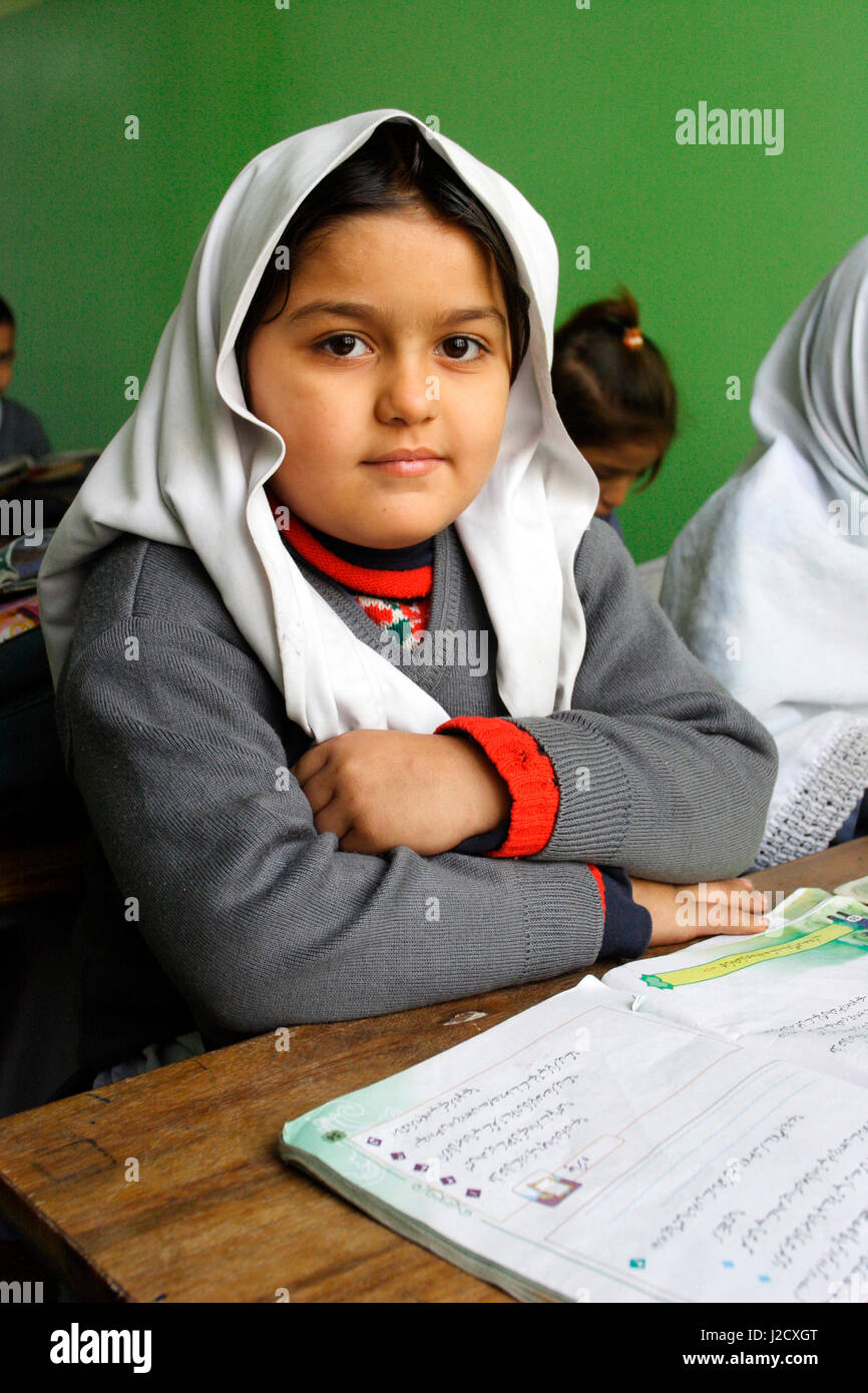A student in a local school studying in Pakistan Stock Photo - Alamy