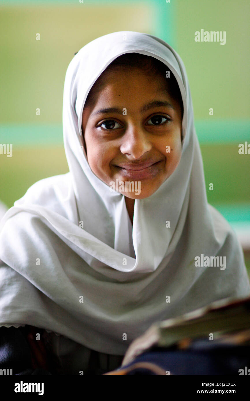 A student in a local school studying in Pakistan Stock Photo - Alamy