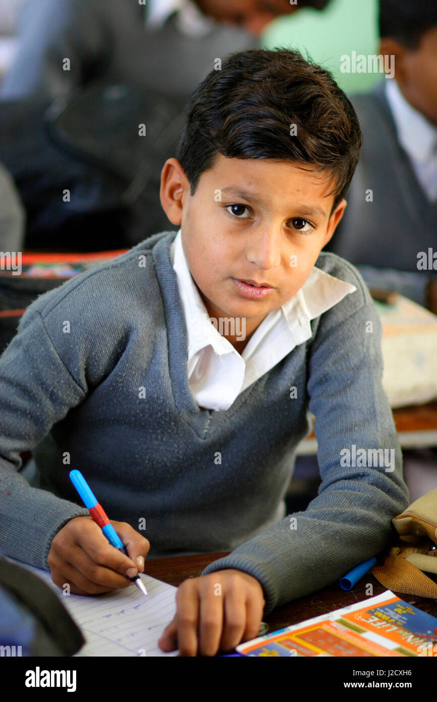 A student in a local school studying in Pakistan Stock Photo - Alamy