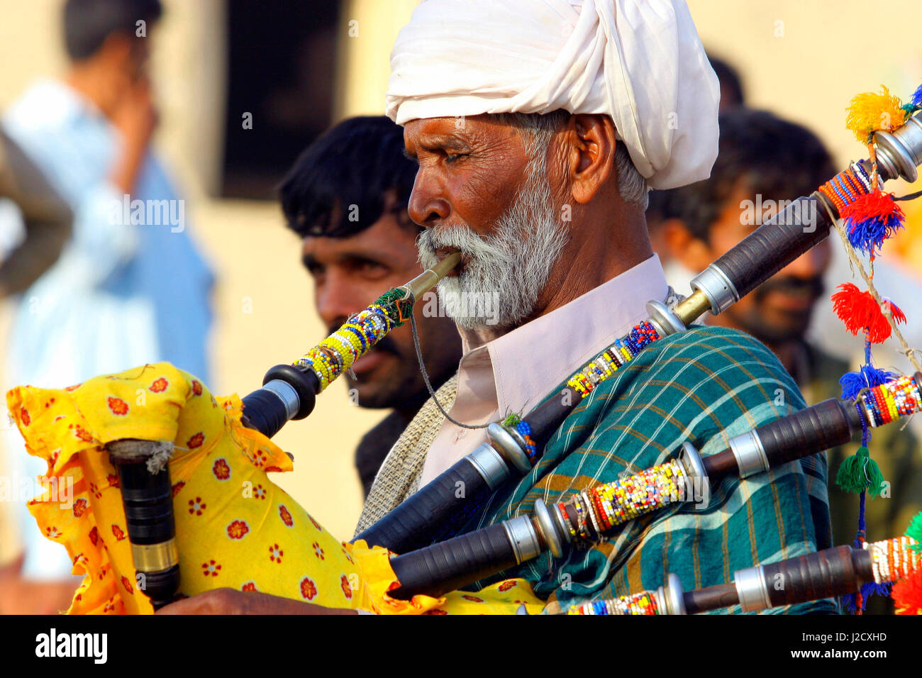 A local musician at Channan Peer festival in Cholistan, Bahawalpur ...