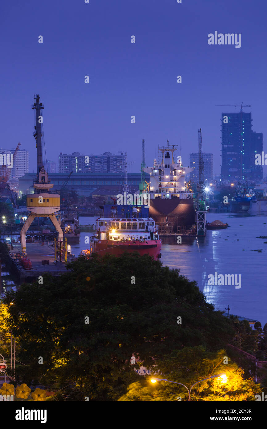 Vietnam, Ho Chi Minh City. Elevated view of Saigon River and shipyard ...