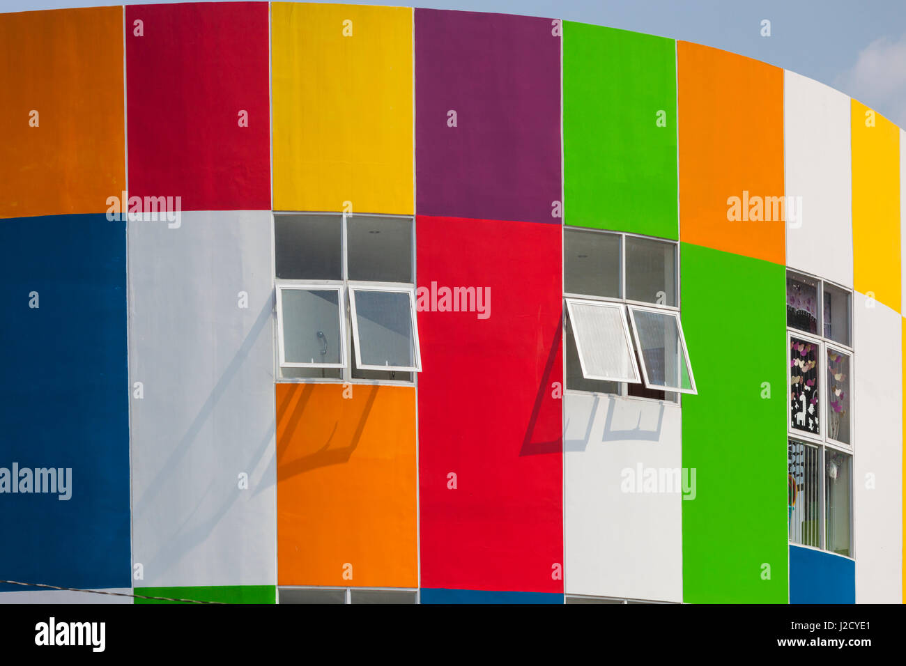 Vietnam, Tay Ninh, colorful school building Stock Photo - Alamy