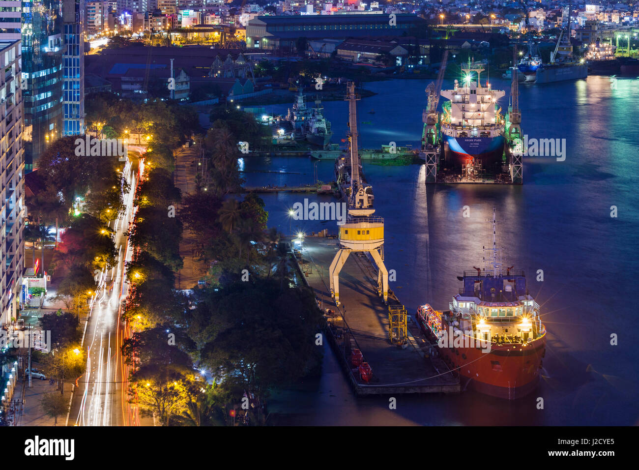 Vietnam, Ho Chi Minh City. Elevated view of Saigon River and shipyard ...