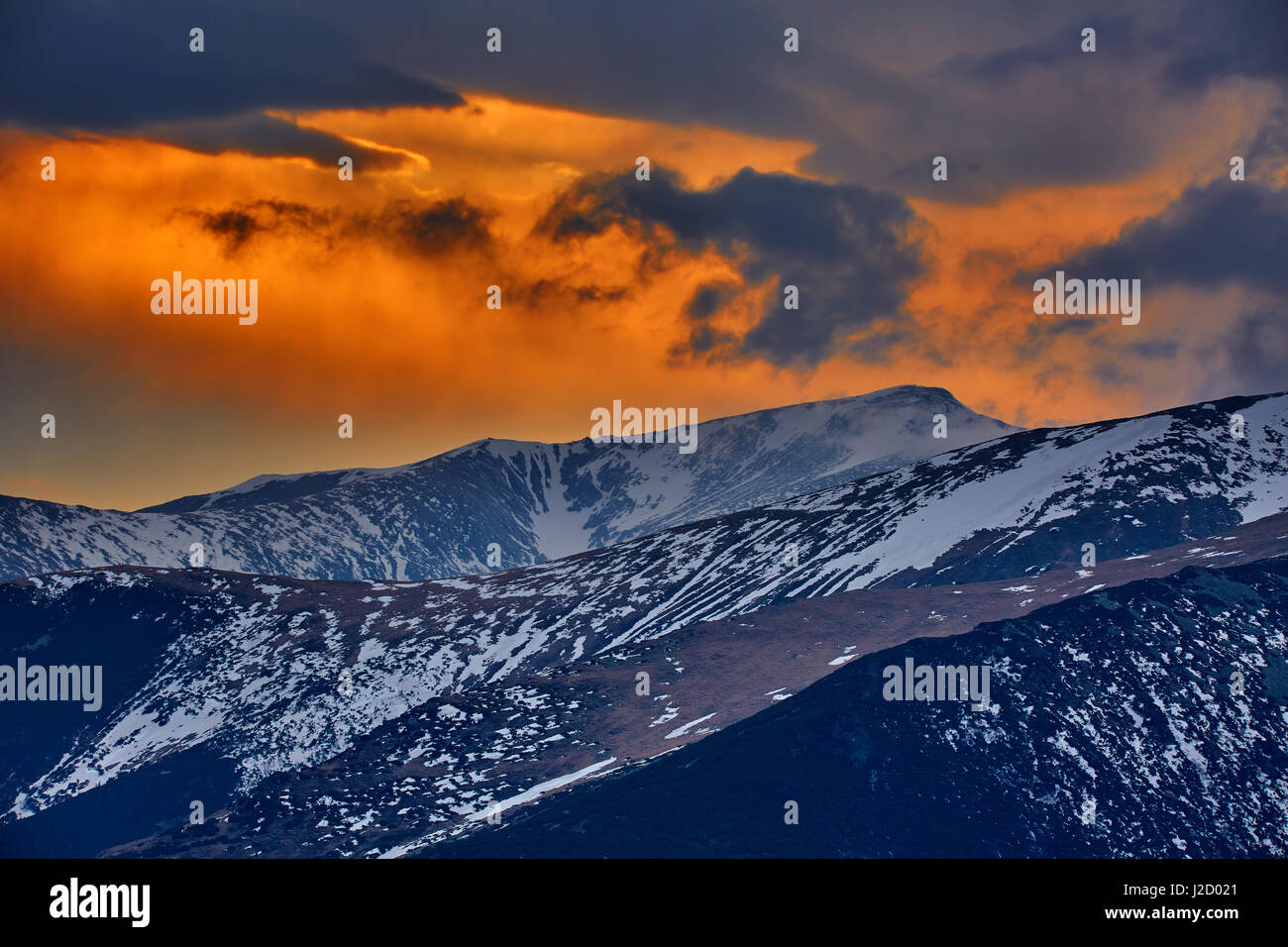 Spring sunset in the Parang mountain range, Romania Stock Photo - Alamy