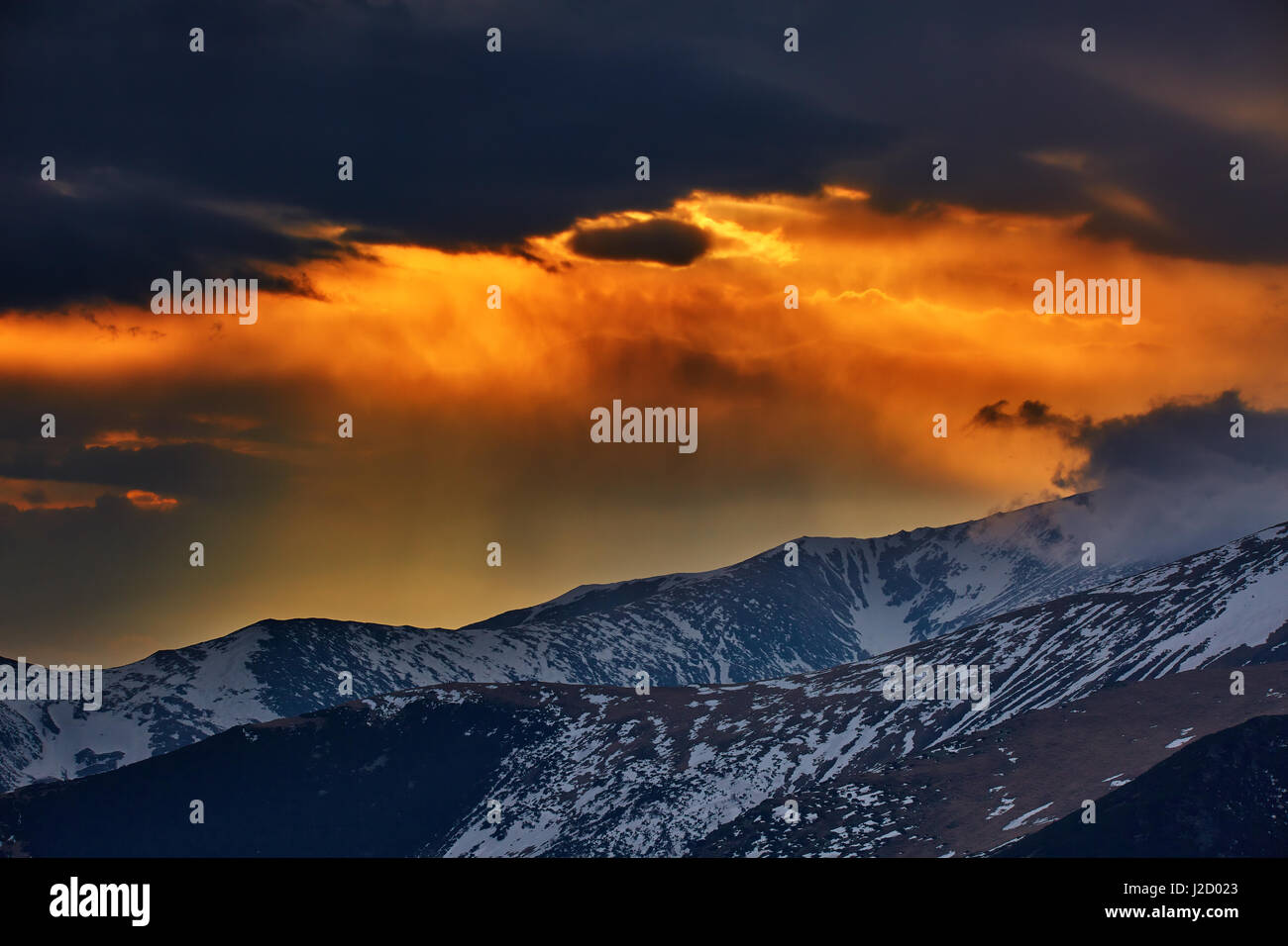 Spring sunset in the Parang mountain range, Romania Stock Photo - Alamy