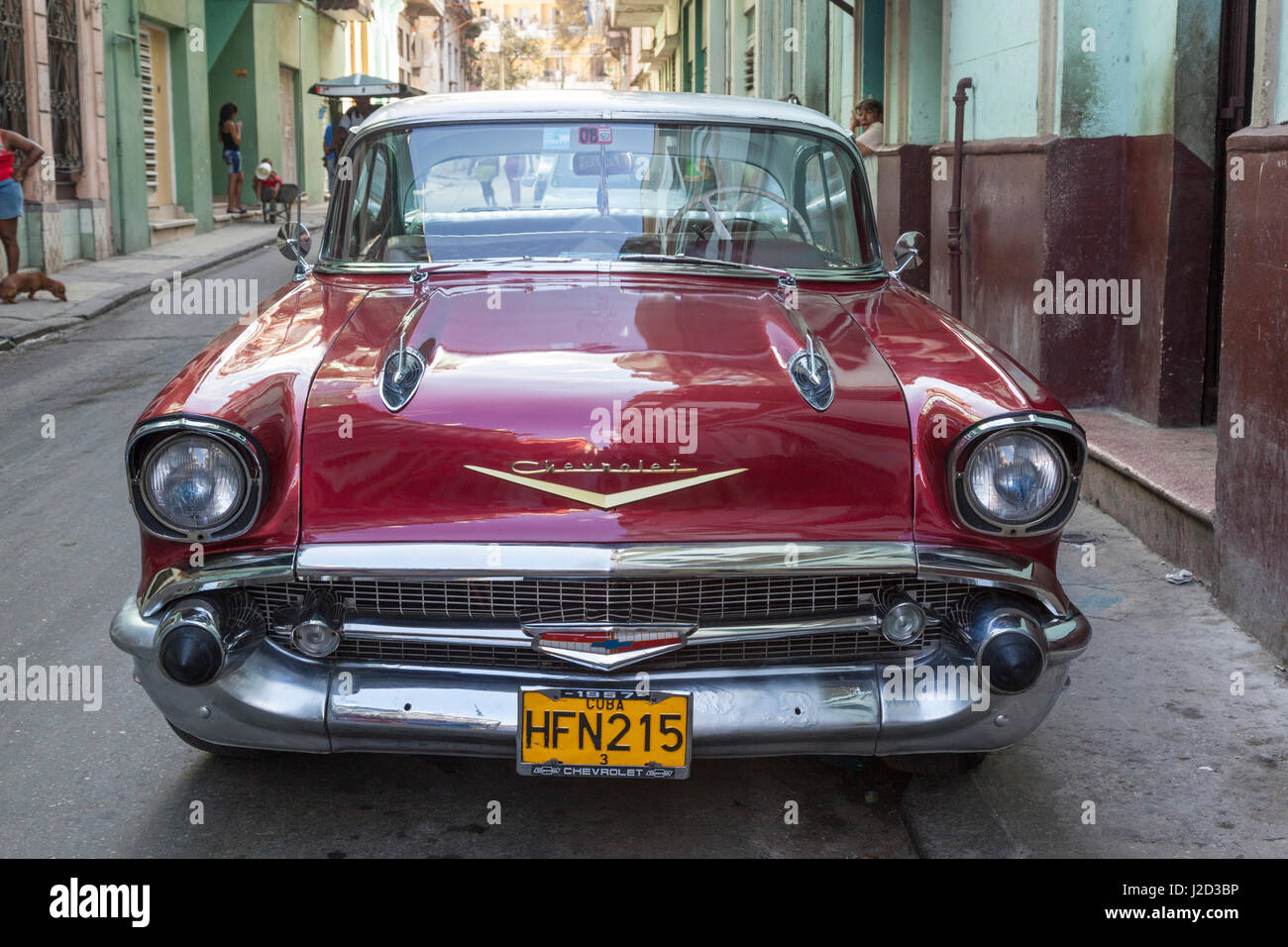 Cuba, Havana. A well-restored classic Chevrolet parked on a city street ...