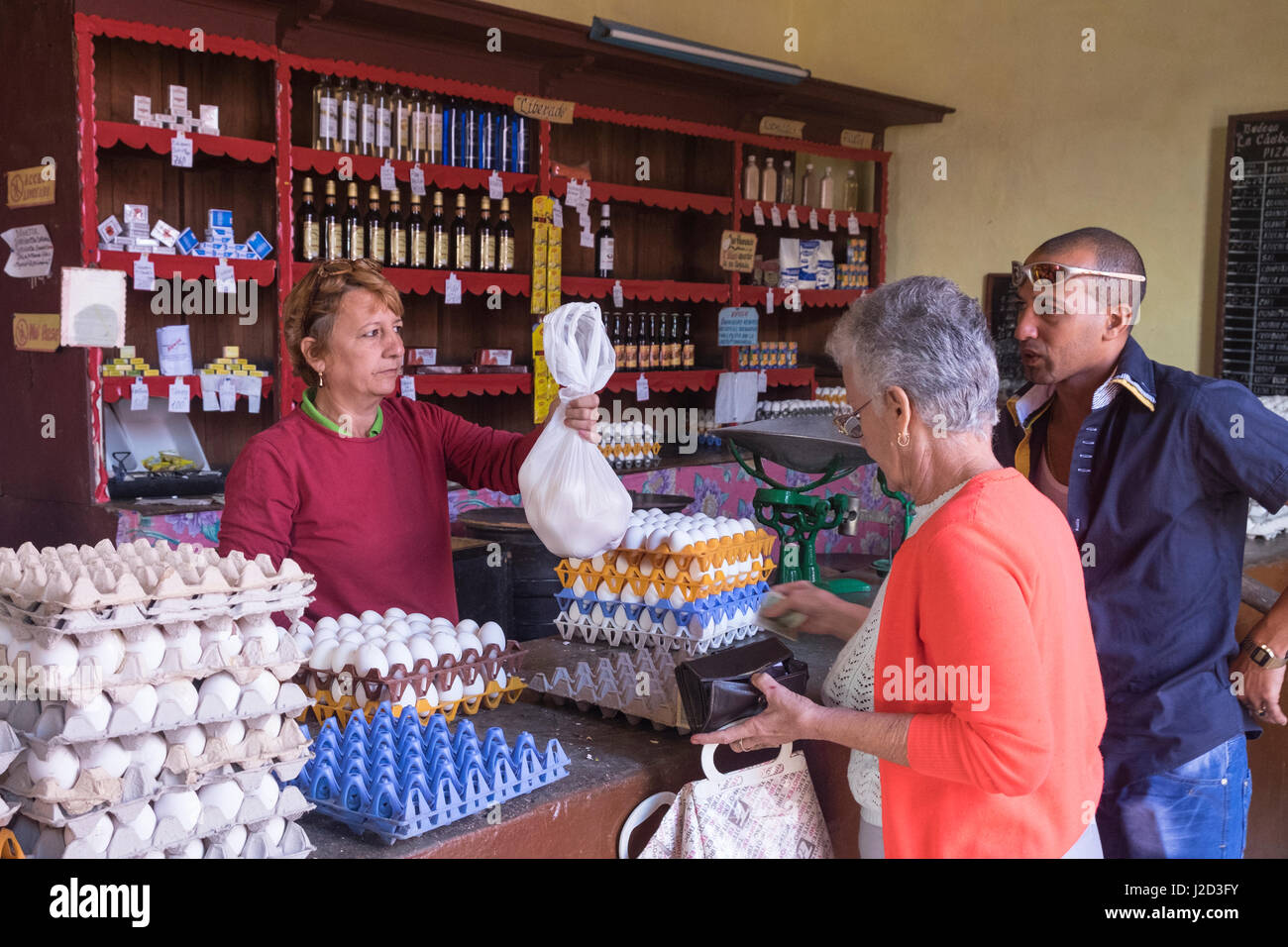 Cuba, Trinidad. Buying eggs in a ration store Stock Photo - Alamy