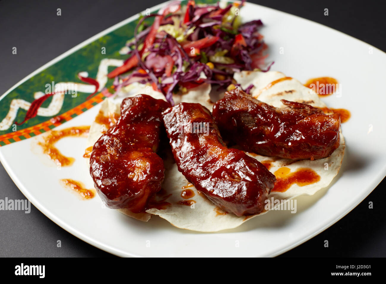 Pork ribs in Mexican style. Mexican food. Mexican cuisine. Studio shot ...