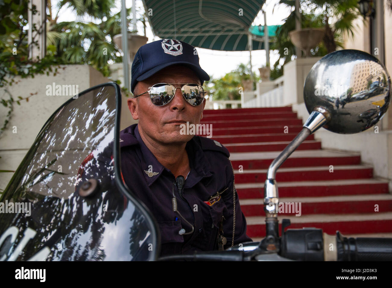 Caribbean, Cuba, Havana. Motorcycle police officer. (Editorial Use Only ...