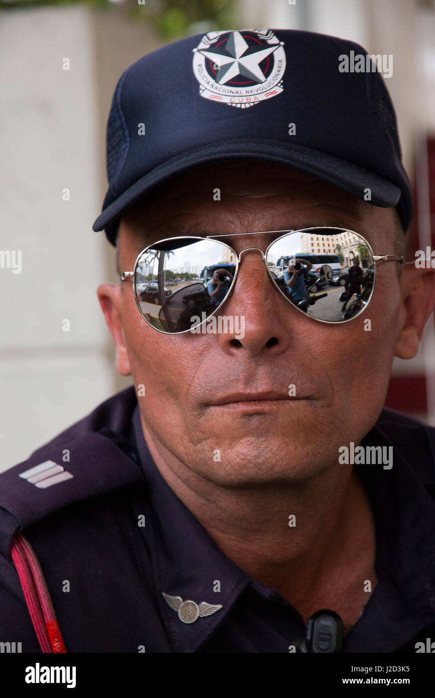 Caribbean, Cuba, Havana. Motorcycle police officer. (Editorial Use Only ...