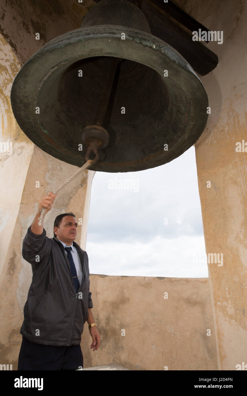 Man ringing giant bell in tower hi-res stock photography and images - Alamy