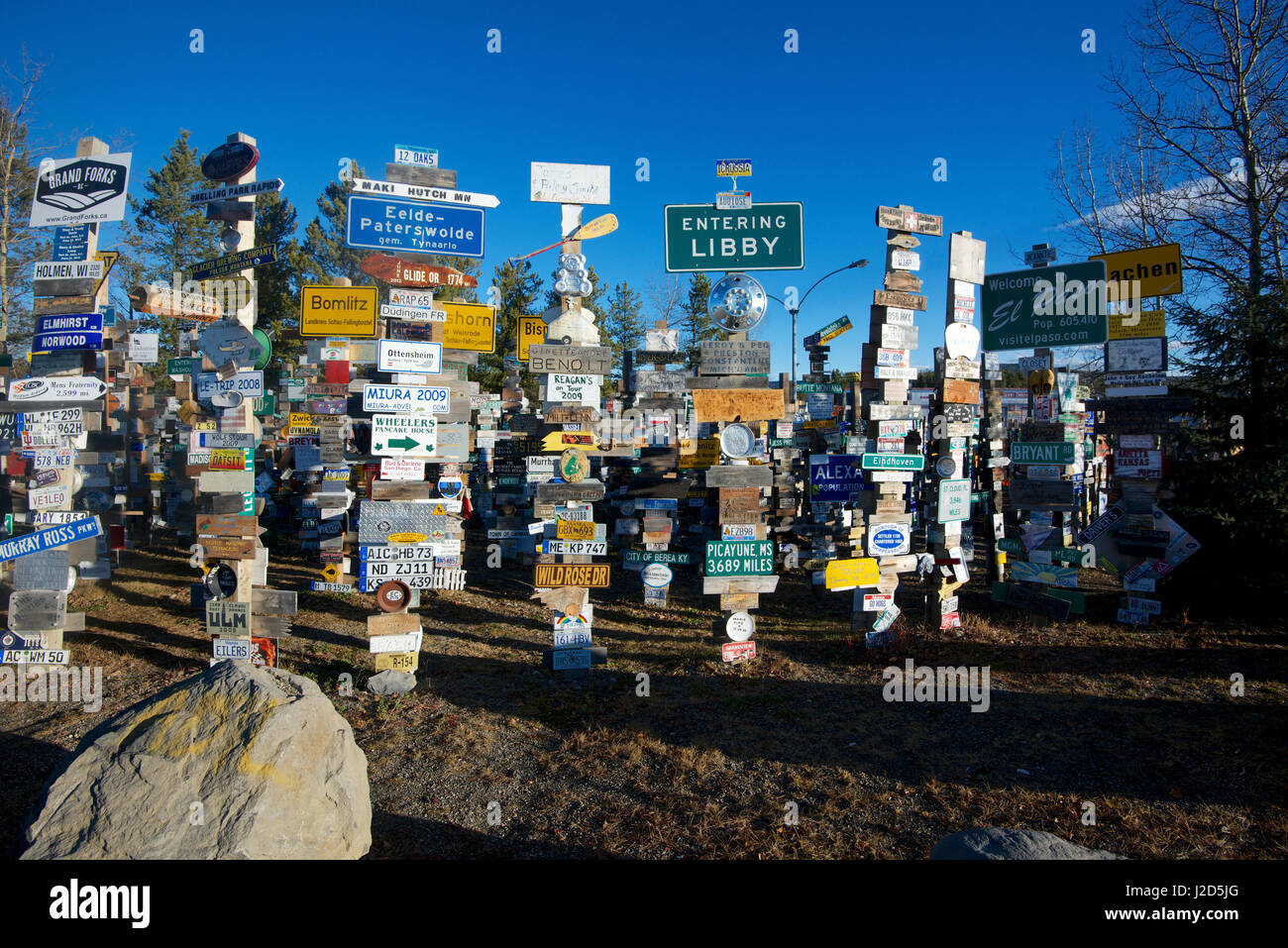The Yukon's Watson Lake Sign Post Forest, begun in the 1940s when US ...
