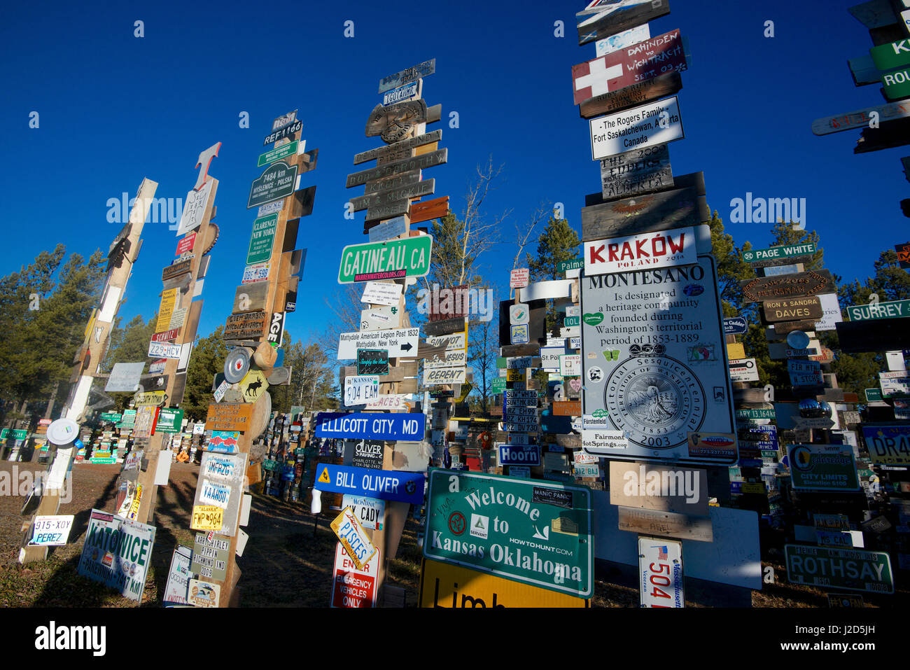 The Yukon's Watson Lake Sign Post Forest, begun in the 1940s when US ...
