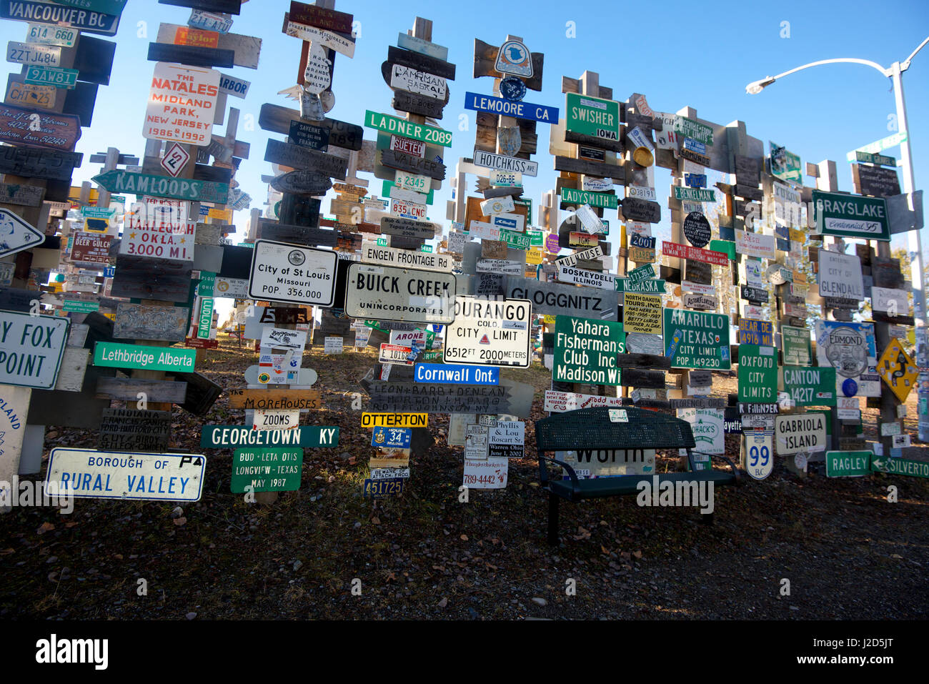 The Yukon's Watson Lake Sign Post Forest, begun in the 1940s when US ...