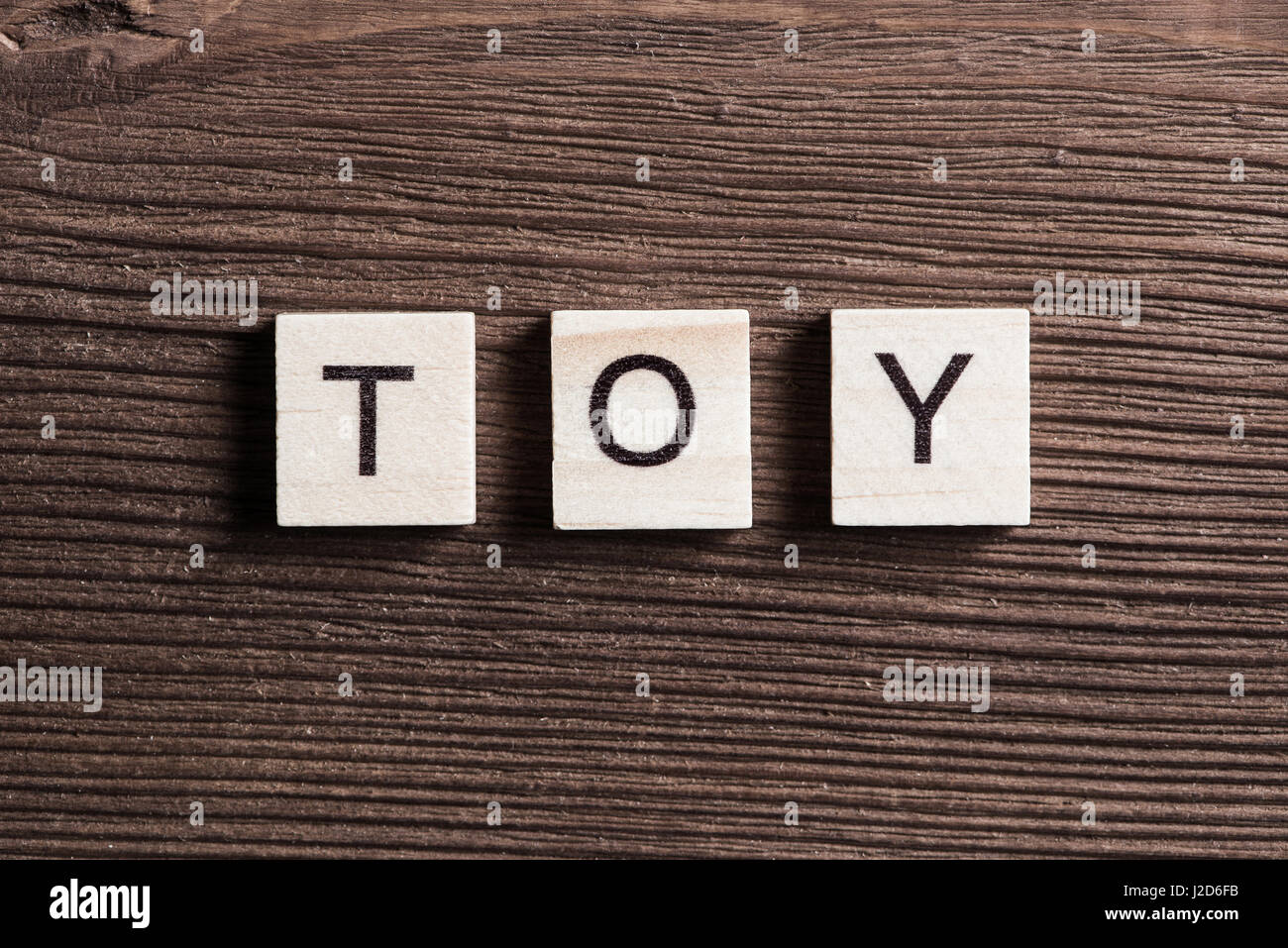 word of wooden elements with letters Stock Photo - Alamy