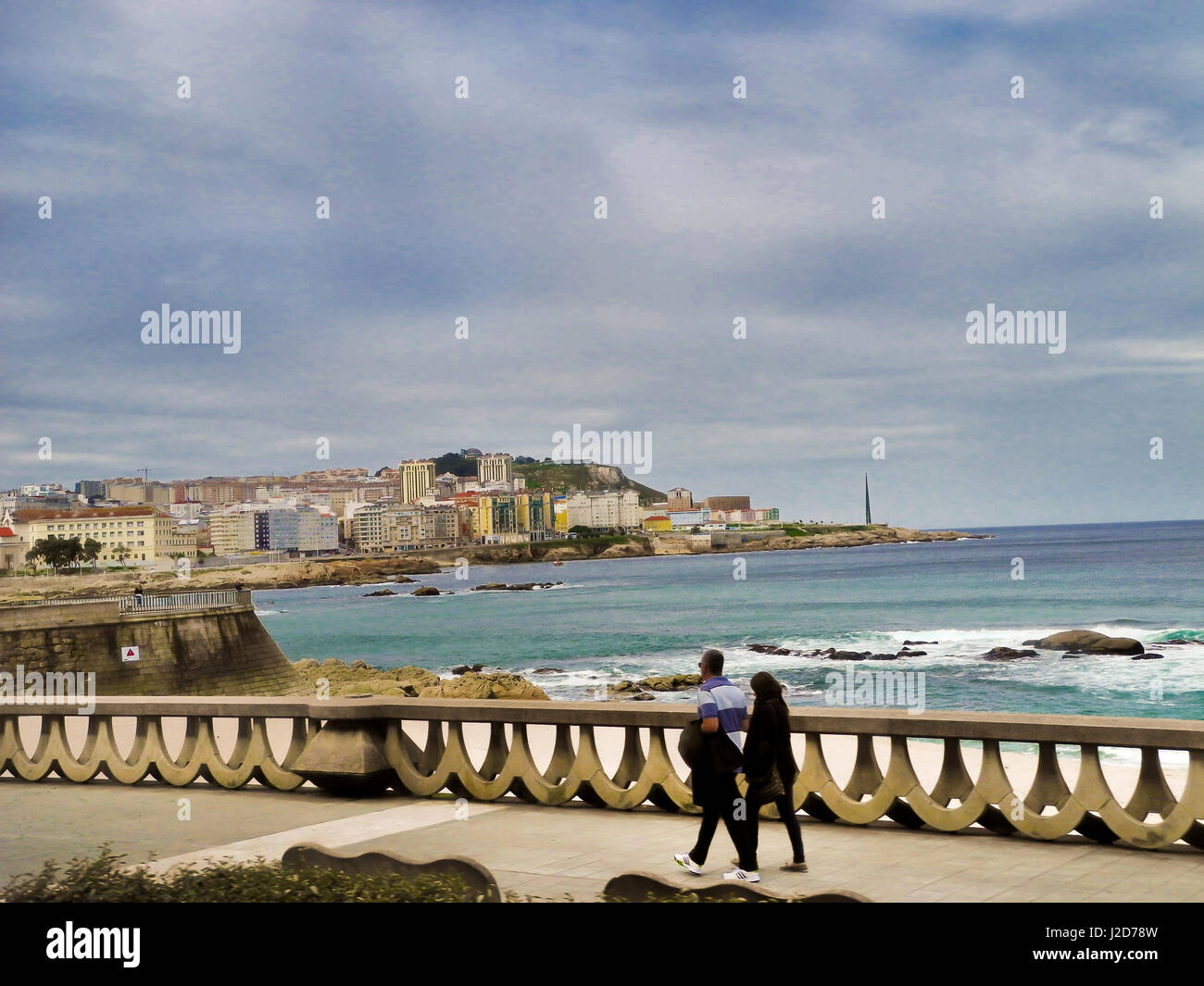LA CORUNA, SPAIN - MARCH 28, 2017: Couple waking at scenic skyline and ...