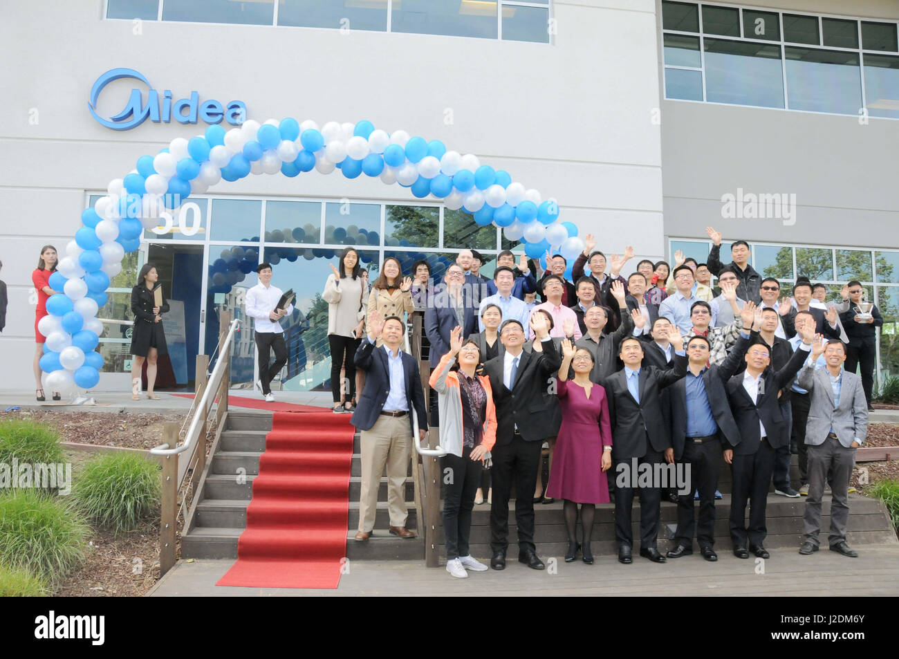 San Francisco, USA. 27th Apr, 2017. Employees of Midea Group pose for ...