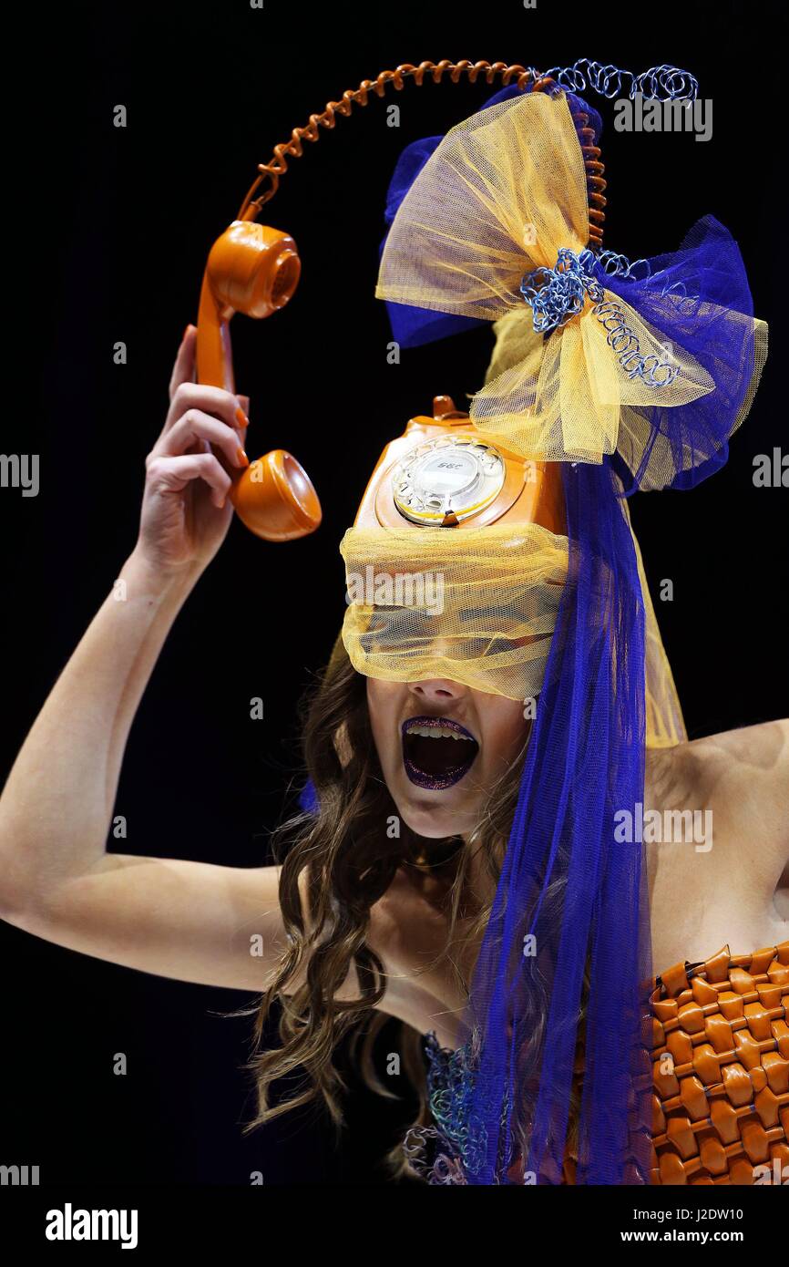 A model wears a creation entitled 'Temporarily Disconnected' as the ...