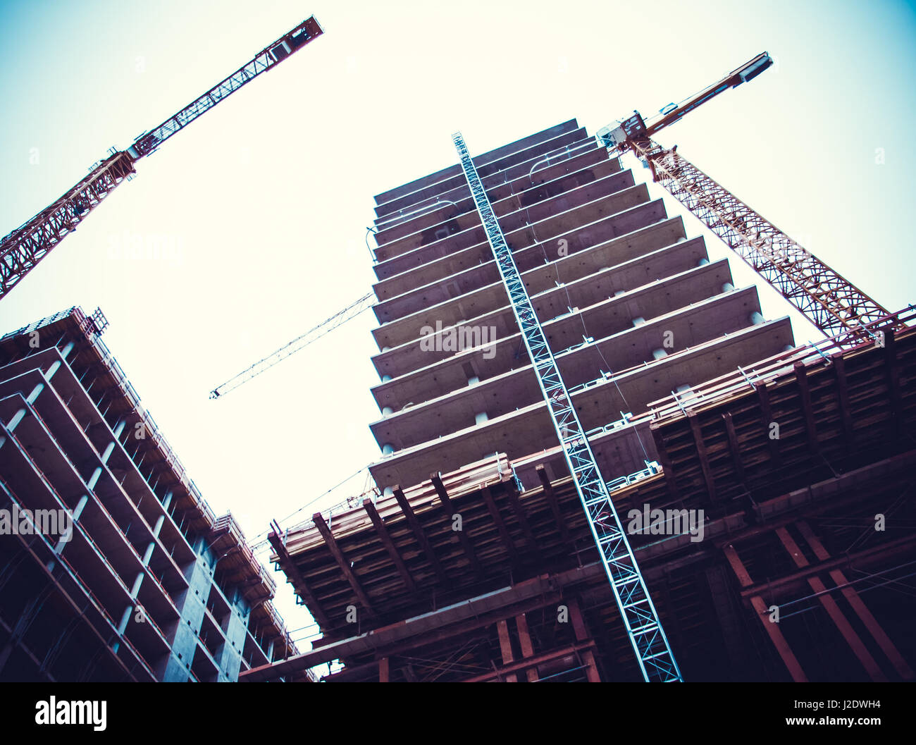 Crane and building construction. big building construction Stock Photo ...