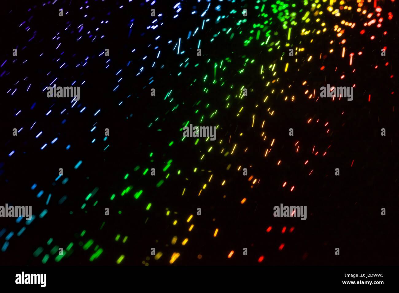 Abstract spectral colours; all of the colours of white light are split ...