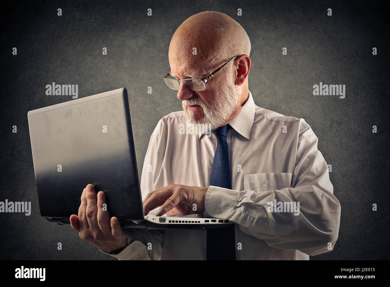 Old businessman laptop working hi-res stock photography and images - Alamy