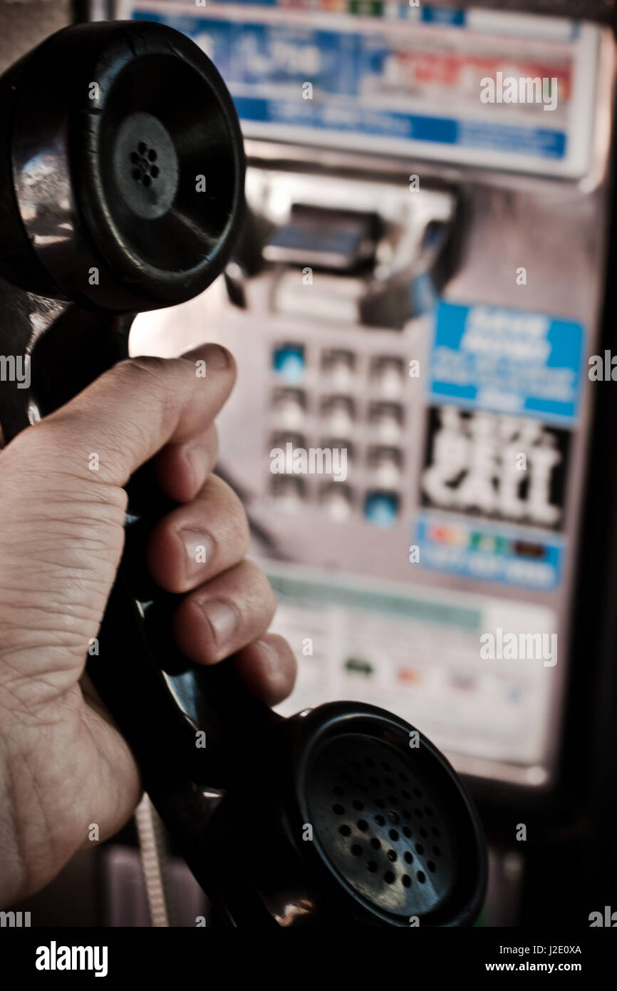 Pay phone quarter hi-res stock photography and images - Alamy