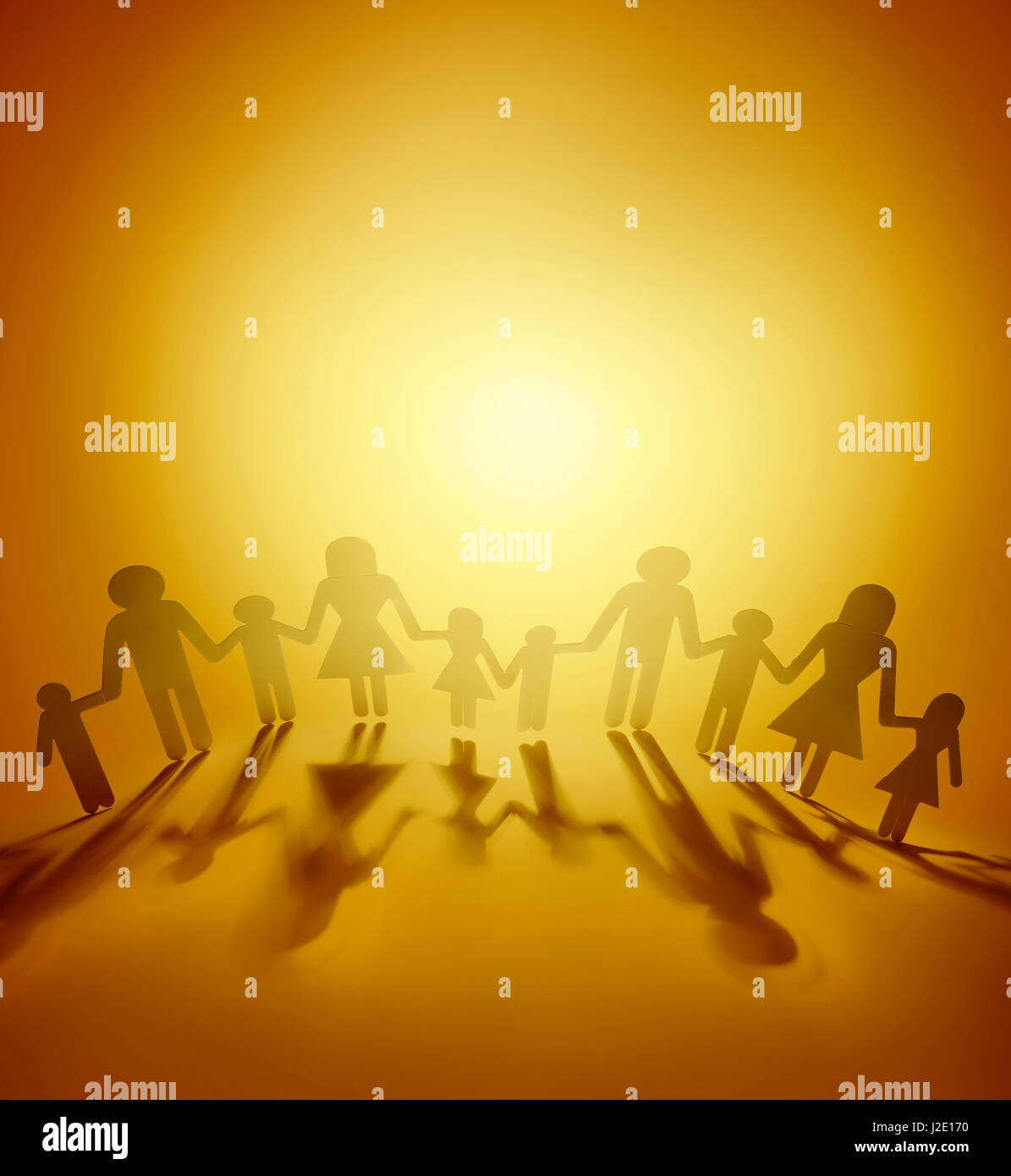 Family paper chain cutout holding hands Stock Photo - Alamy