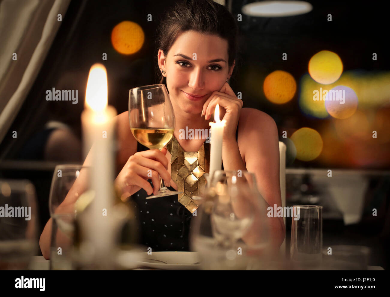Elegant woman on romantic date Stock Photo - Alamy
