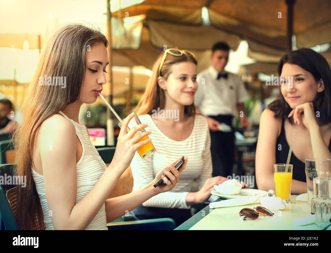 Woman restaurant smile young glass hi-res stock photography and images ...