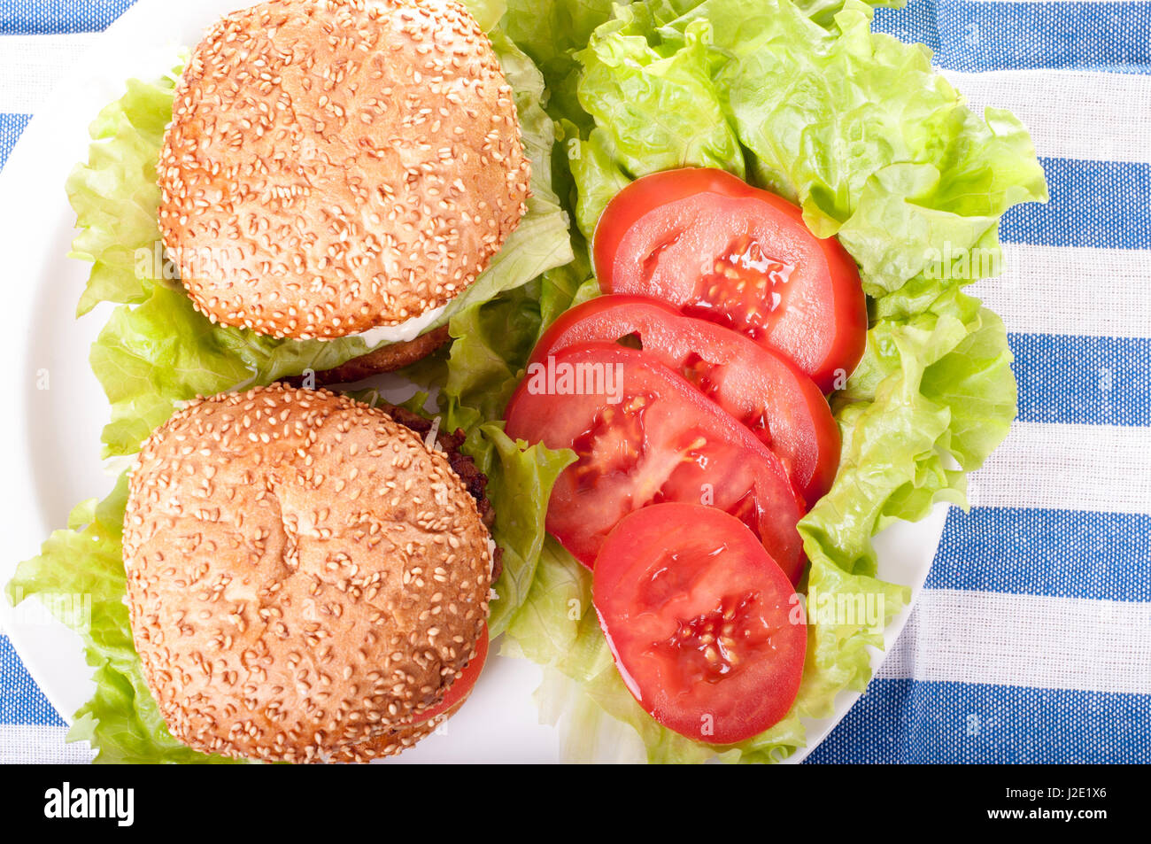 Delicious fresh homemade burger on a fabric background Stock Photo - Alamy