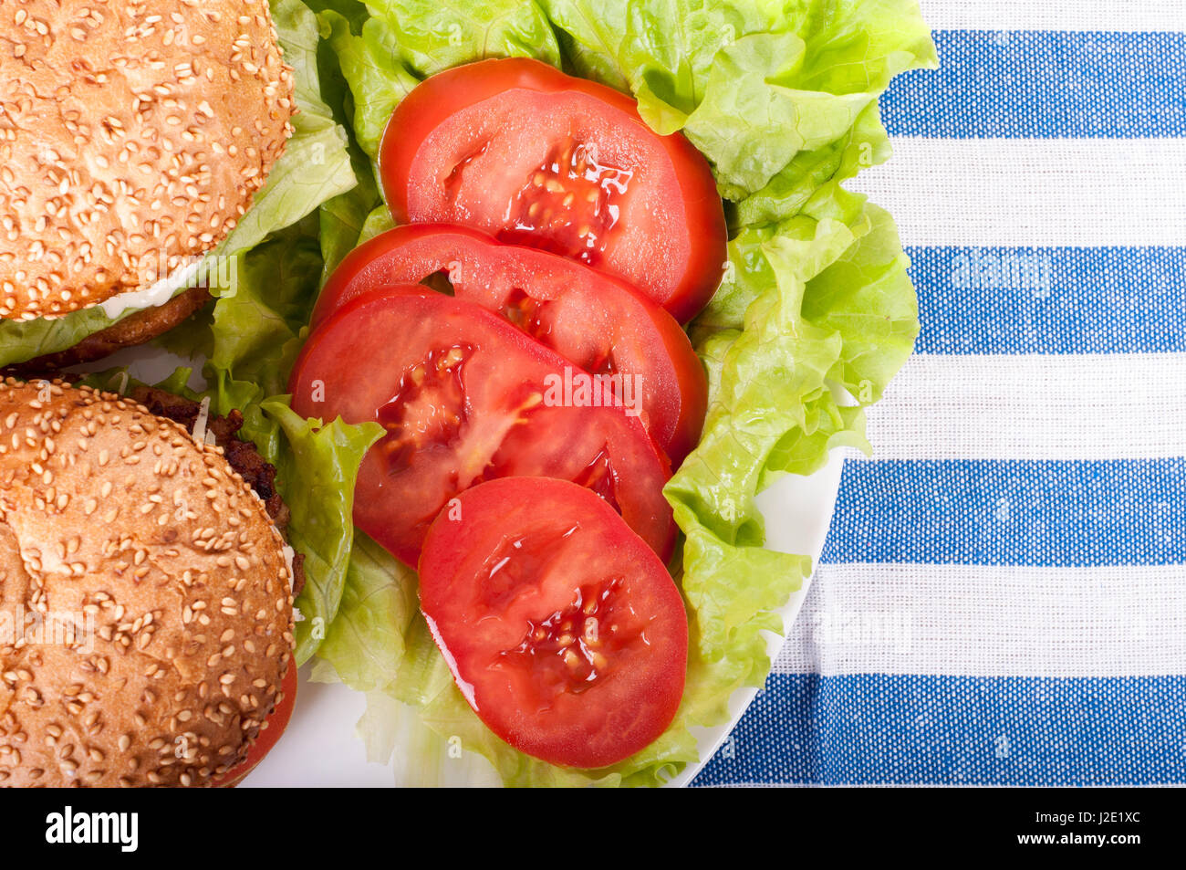 Delicious fresh homemade burger on a fabric background Stock Photo - Alamy