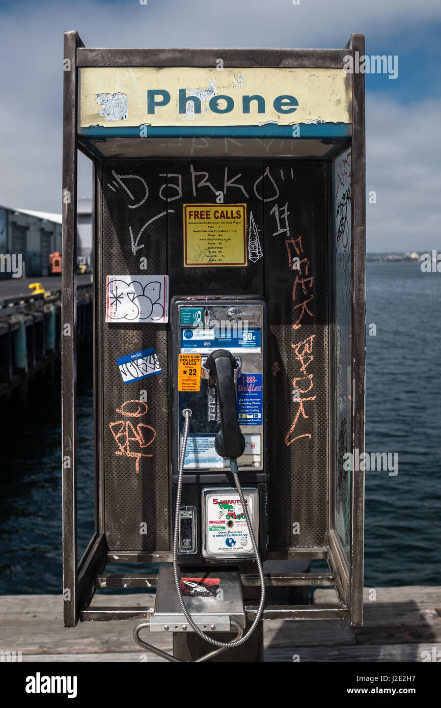 Graffiti covered Public Phone Booth, San Diego waterfront Stock Photo ...