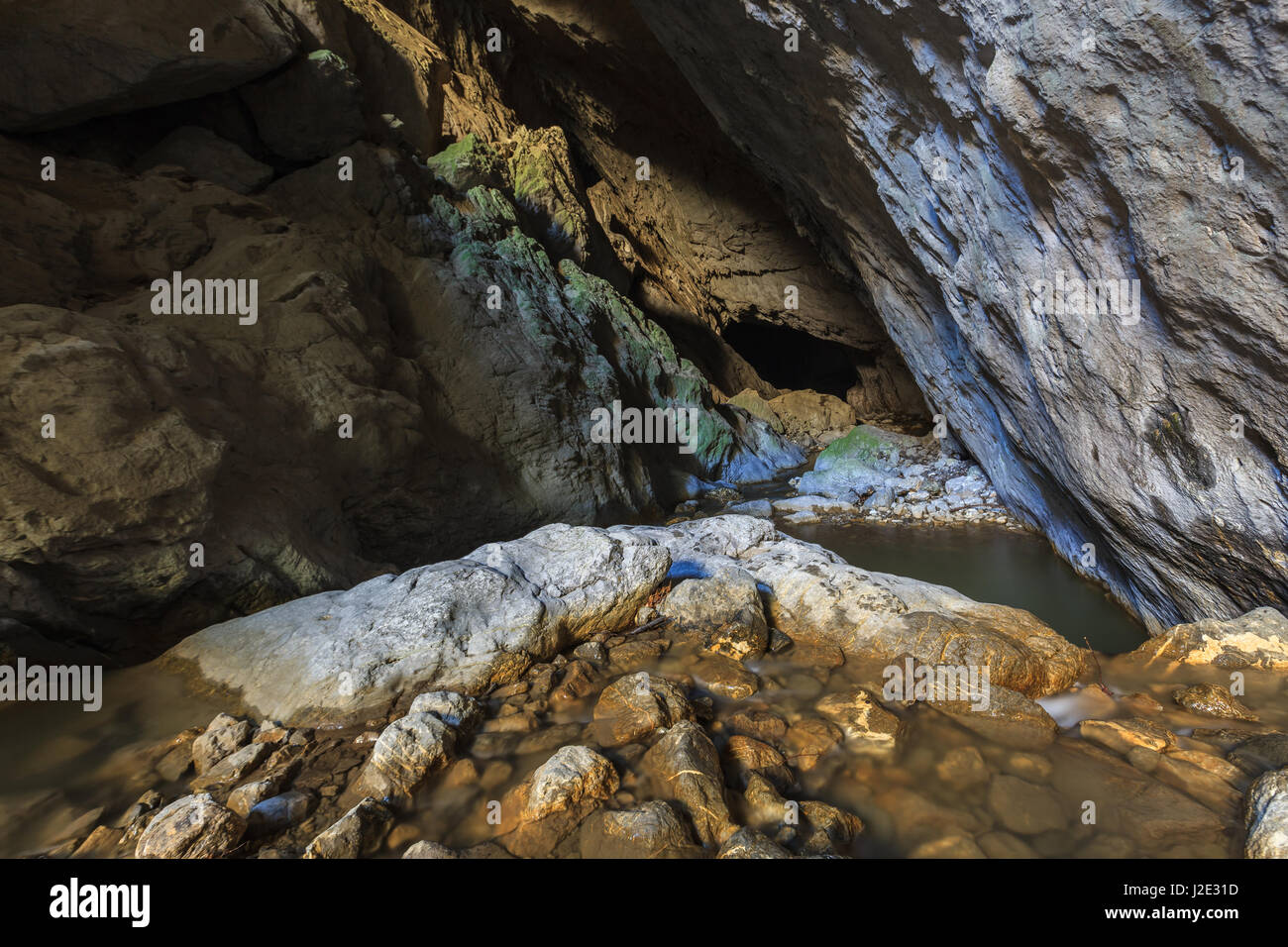 Ponicova cave entrance in the left bank of the Danube in Ciucaru Mare ...